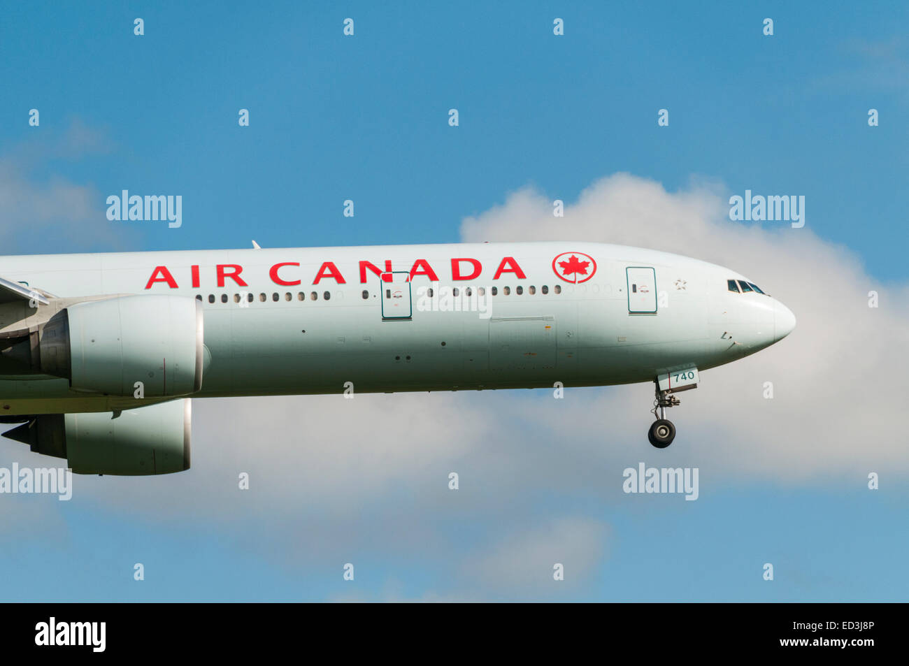 side view of an Air Canada Boeing 777 aeroplane as it comes in to land ...