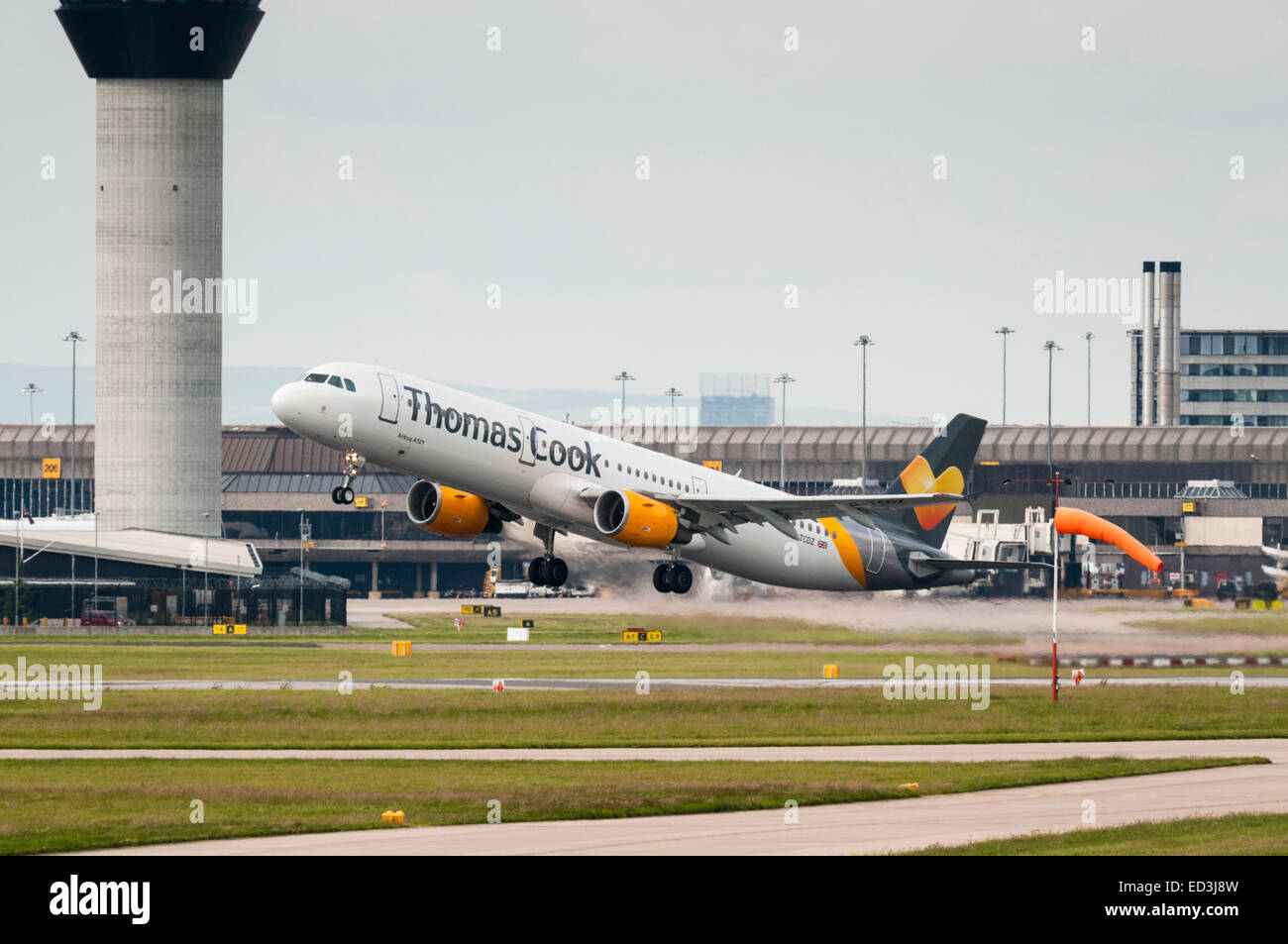 Thomas Cook Airbus A321 aeroplane taking off in front of the control ...