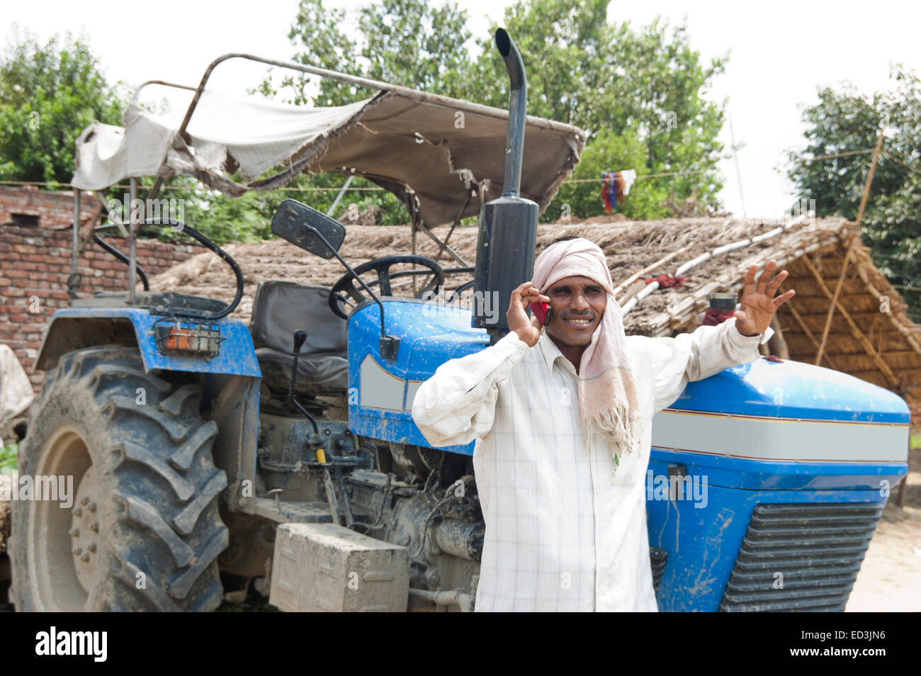 1 indian rural man talking phone Stock Photo - Alamy