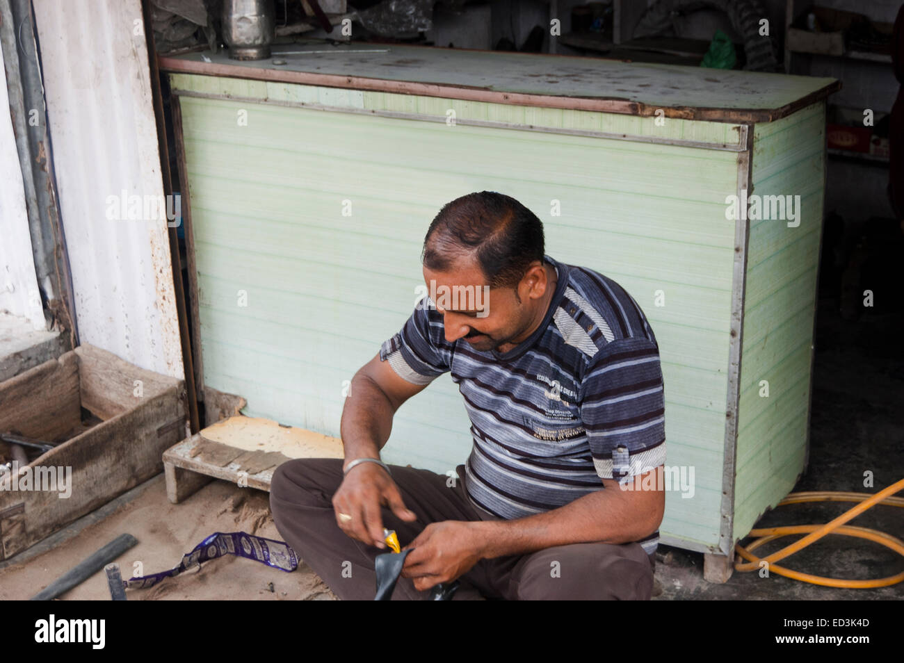 Indian cycle repair hi-res stock photography and images - Alamy