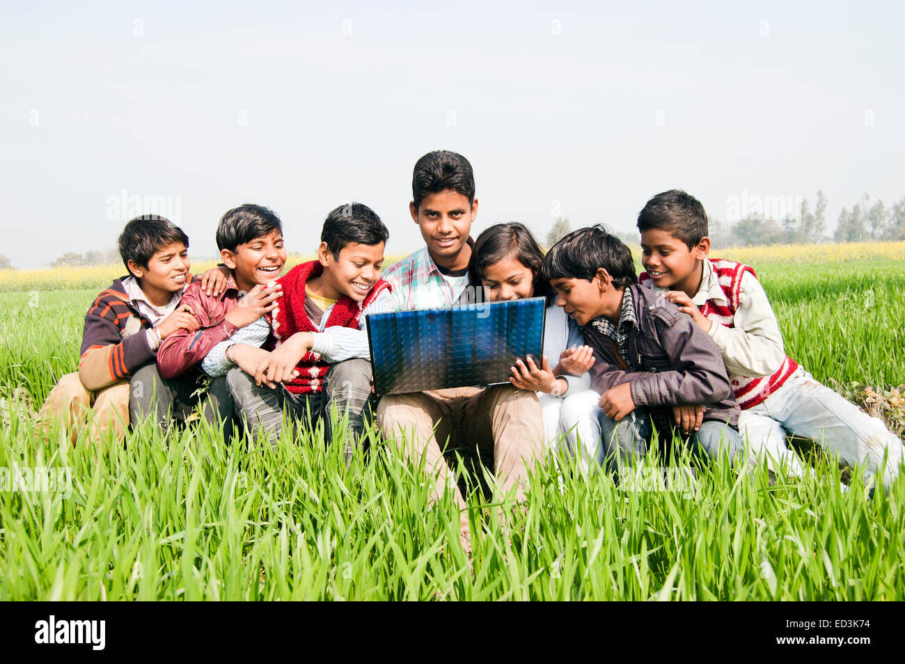 indian rural Children Group field laptop enjoy Stock Photo - Alamy