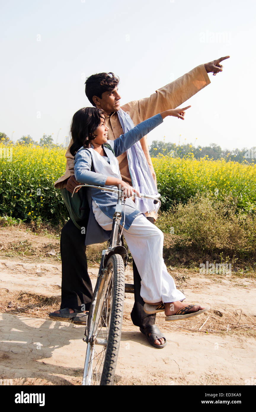 indian farmer and daughter Riding Cycle Stock Photo - Alamy