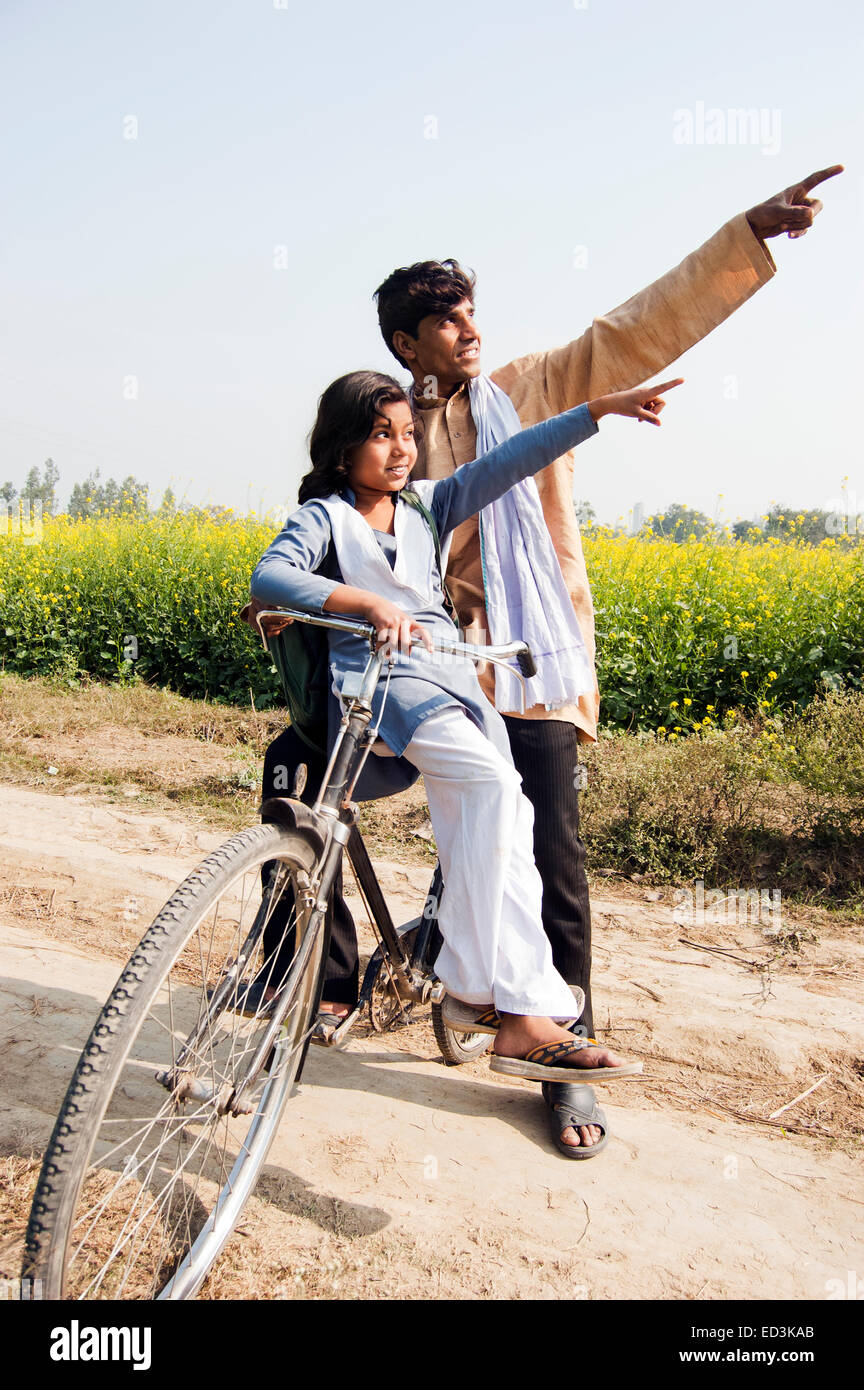 indian farmer and daughter Riding Cycle Stock Photo - Alamy