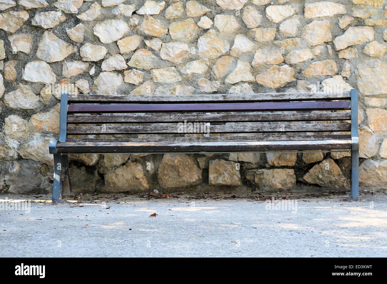 Wooden bench with wall Stock Photo - Alamy