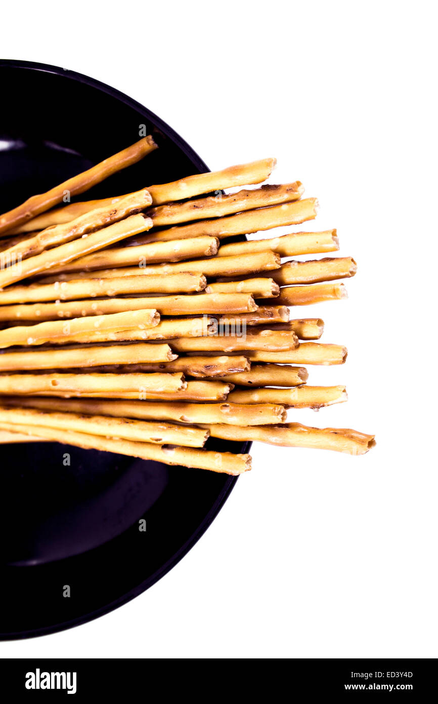 pile of pretzel sticks on white background Stock Photo - Alamy