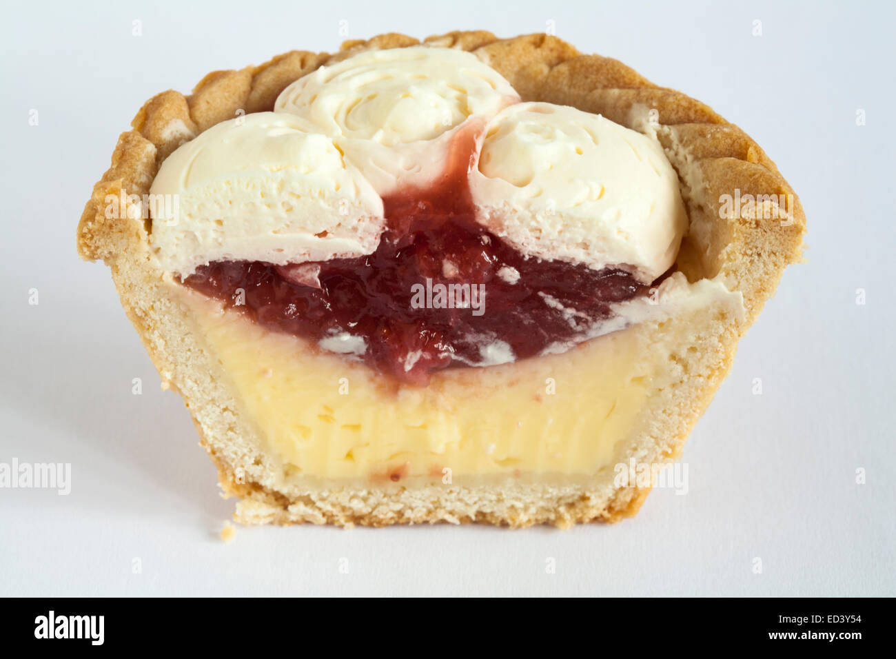 Tesco fresh Strawberry & Cream Custard Tart cut in half isolated on ...