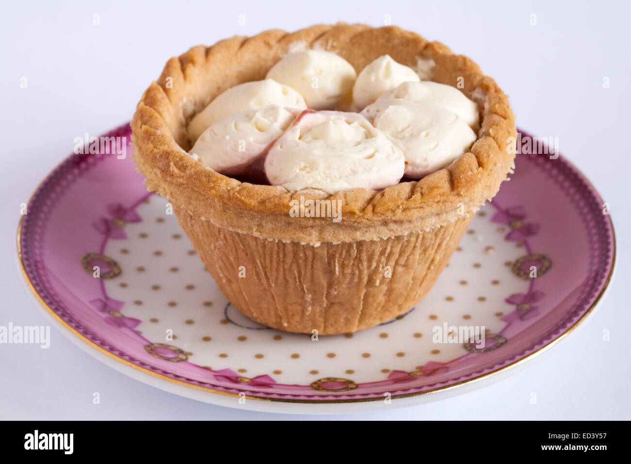 Tesco fresh Strawberry & Cream Custard Tart on plate isolated on white ...