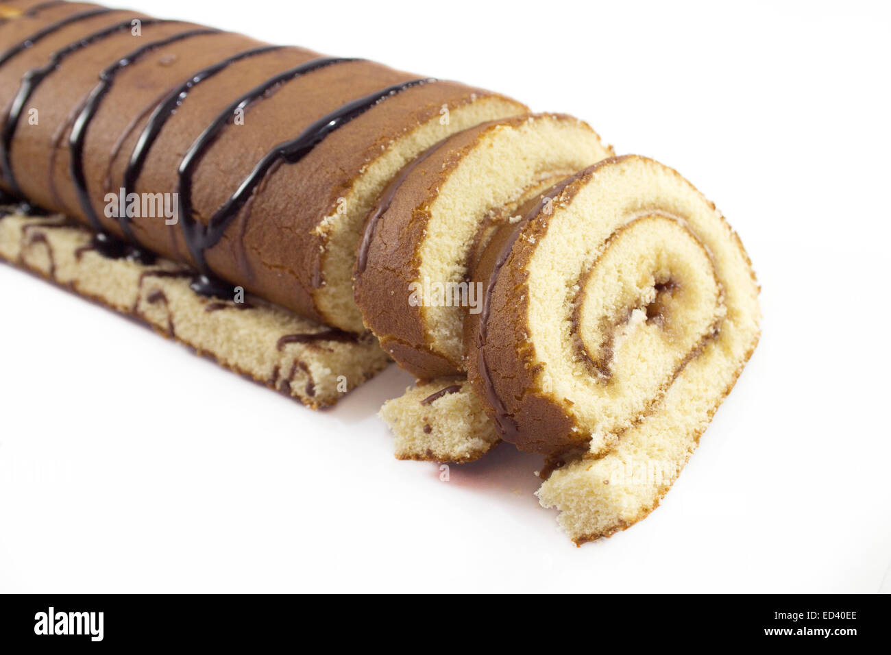 Sweet roll cake isolated on white background Stock Photo - Alamy