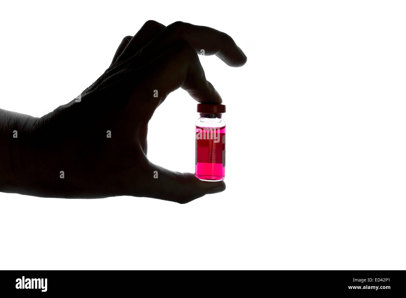 Hand Holding Vial Stock Photo - Alamy