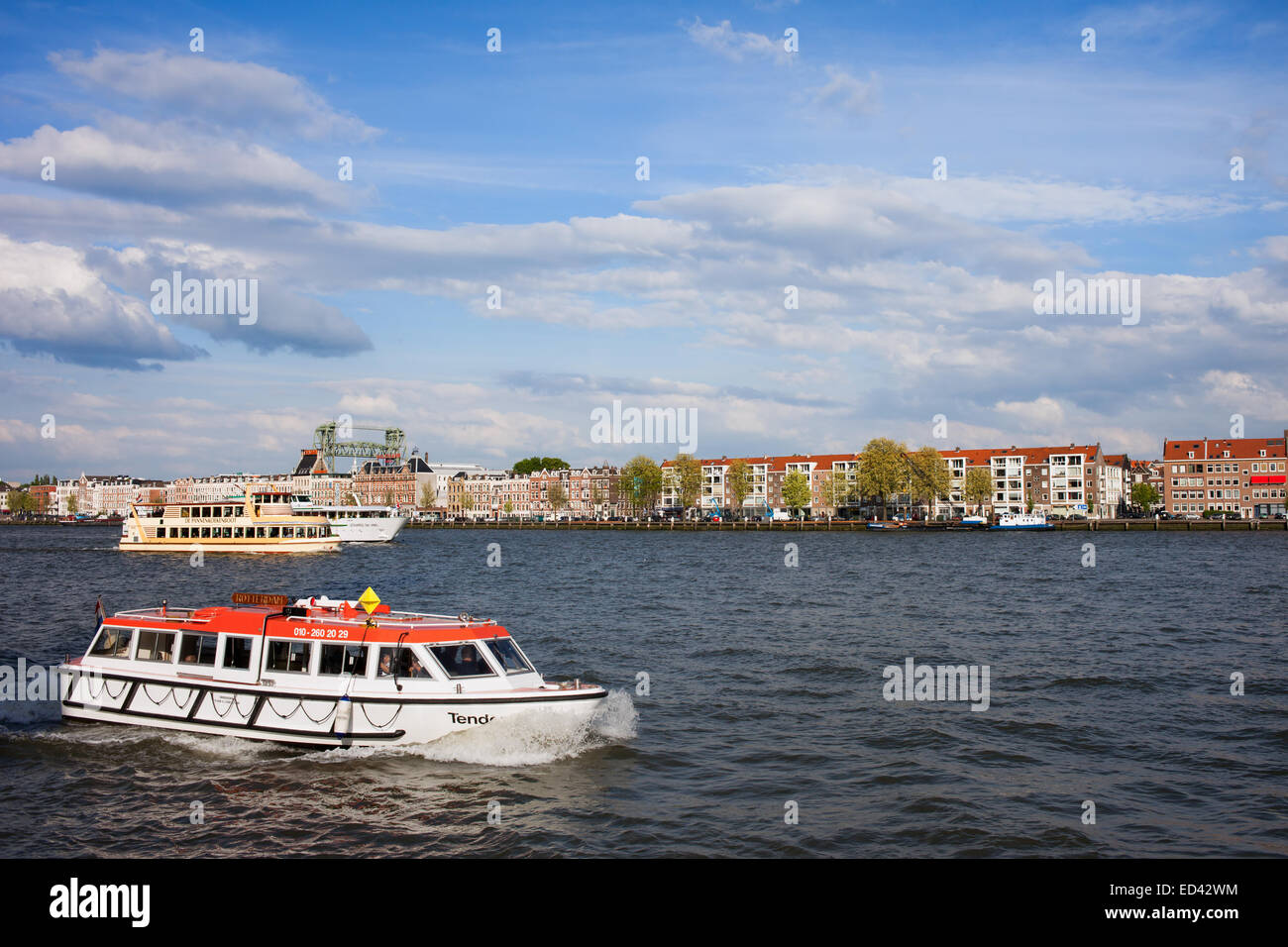Tour boat on a river in Rotterdam, Holland, Netherlands Stock Photo - Alamy