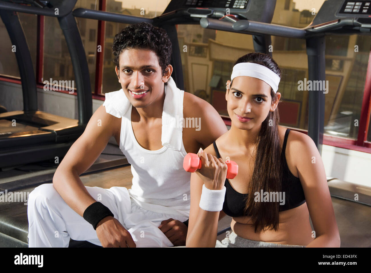 indian sports Trainer and lady Dumbbell Exercise Stock Photo - Alamy