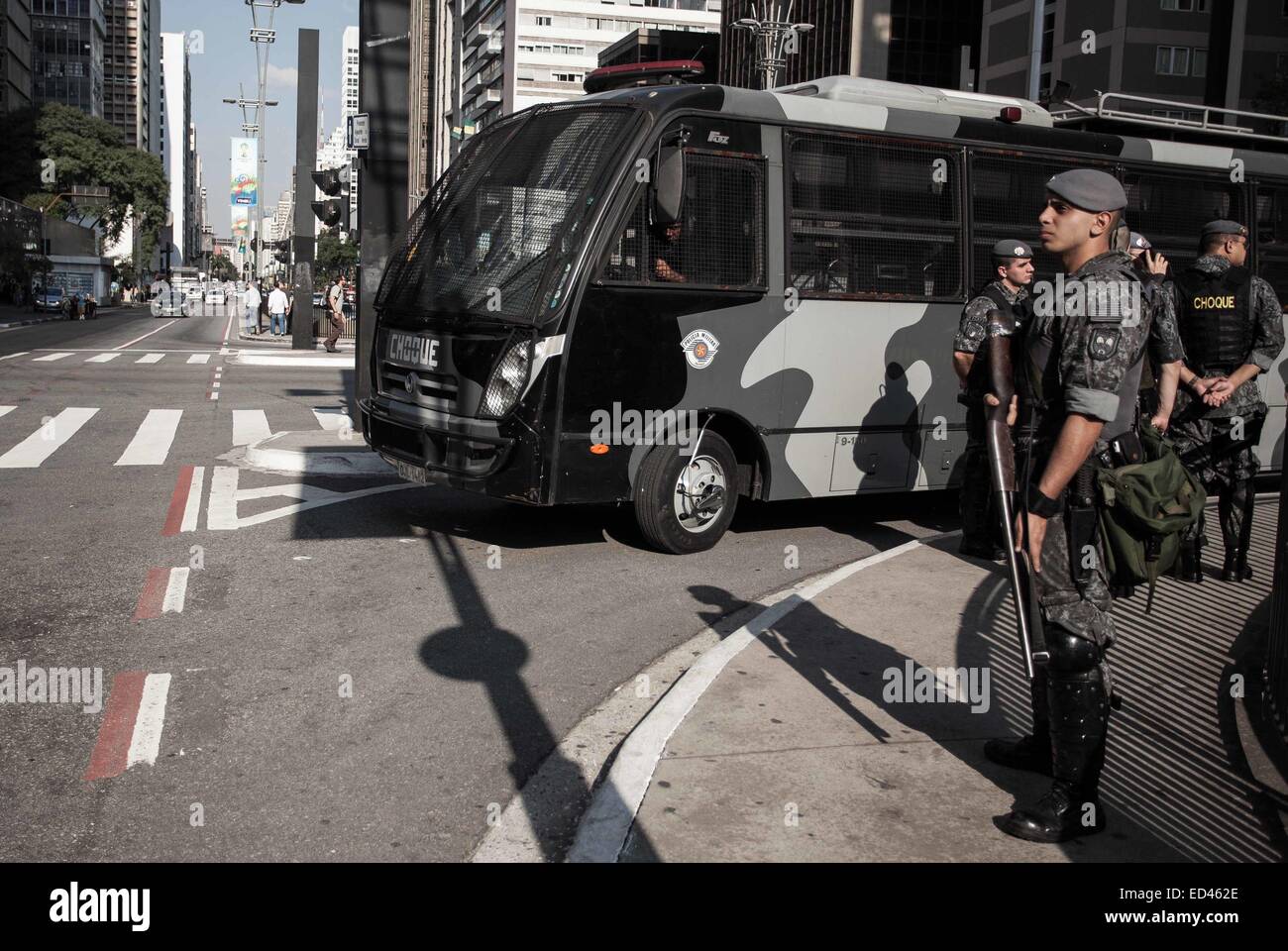 Armed riot police patrol the streets of Sao Paulo during the 2014 FIFA ...