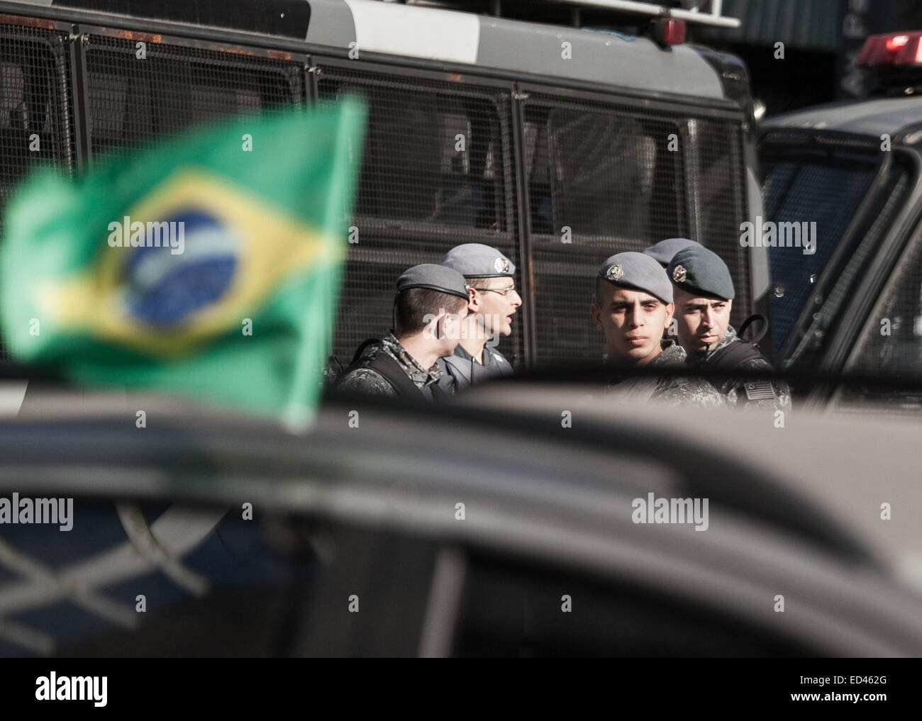 Armed riot police patrol the streets of Sao Paulo during the 2014 FIFA ...