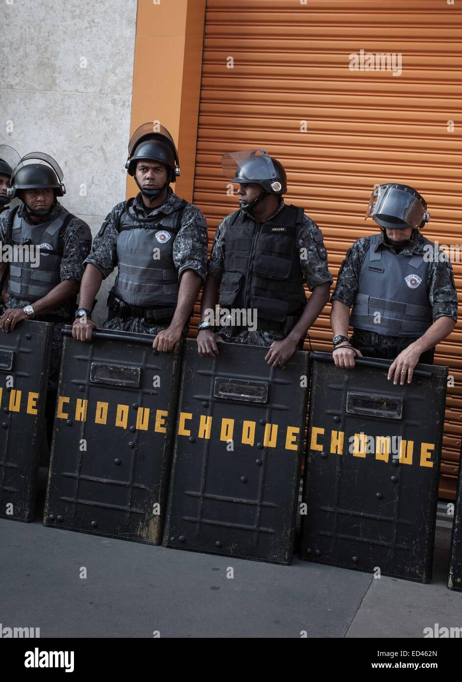 Armed riot police patrol the streets of Sao Paulo during the 2014 FIFA ...
