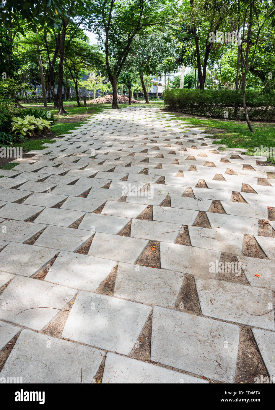 White tile pavement in the urban park Stock Photo - Alamy