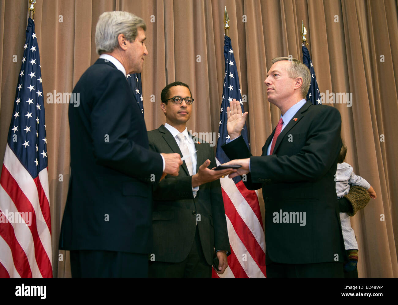 U.S. Secretary of State John Kerry swears in Ambassador Ted Osius III ...