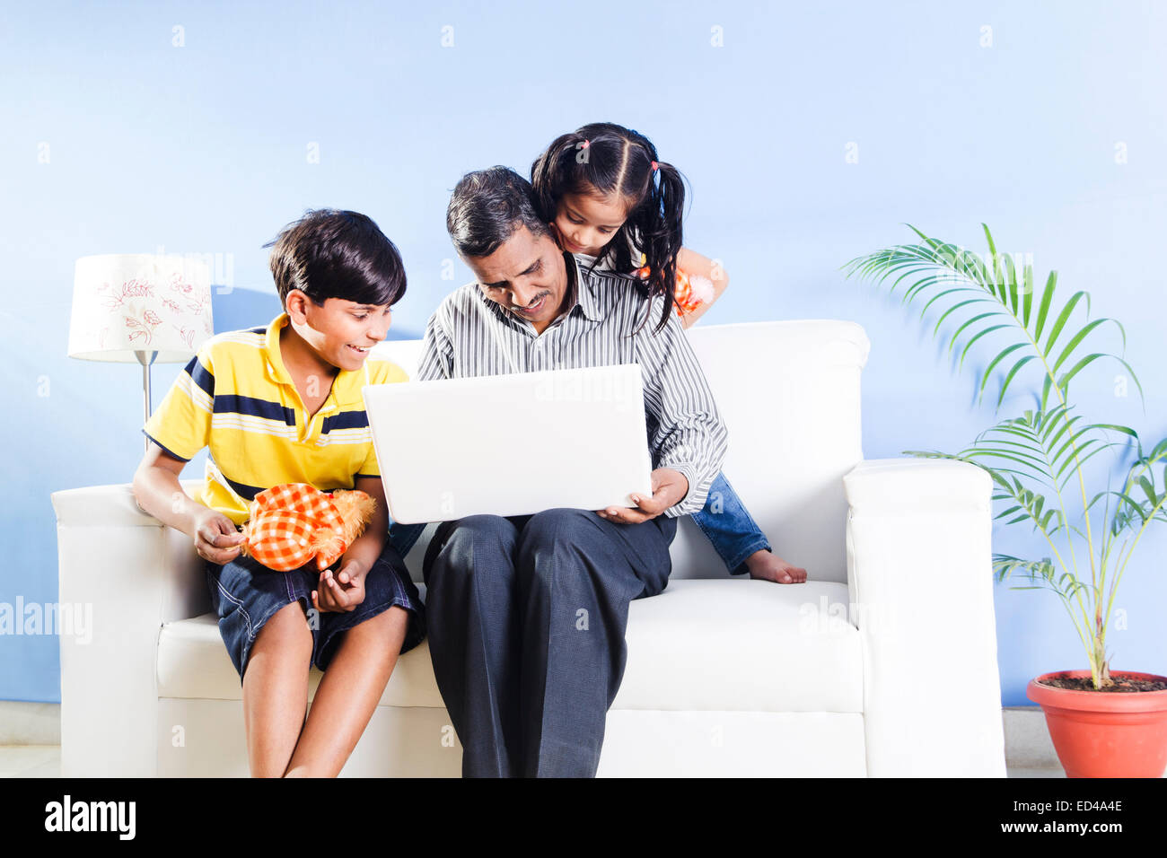 Business man watching kids playing hi-res stock photography and images ...