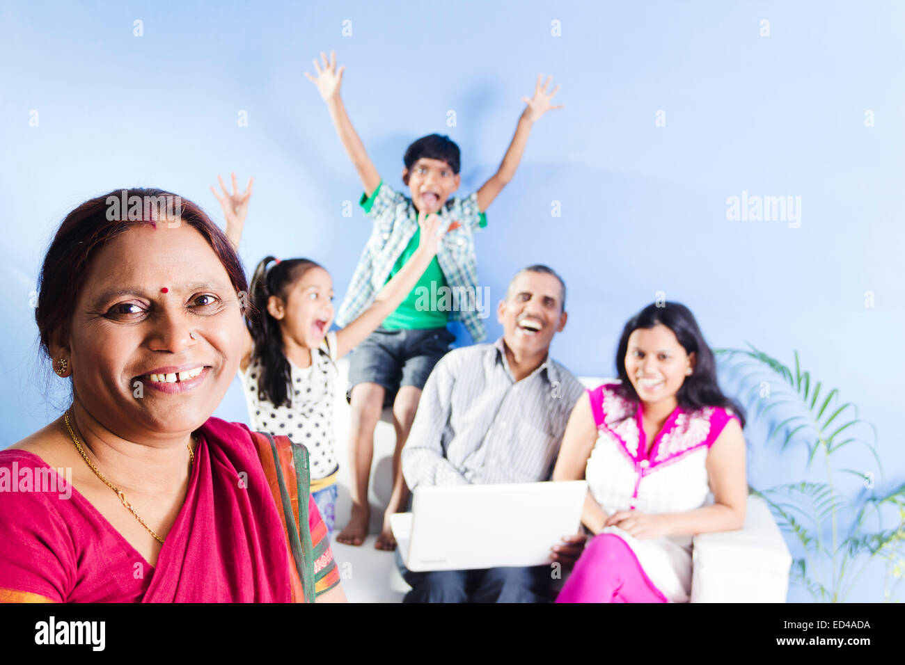 indian Parents with children home fun Stock Photo - Alamy