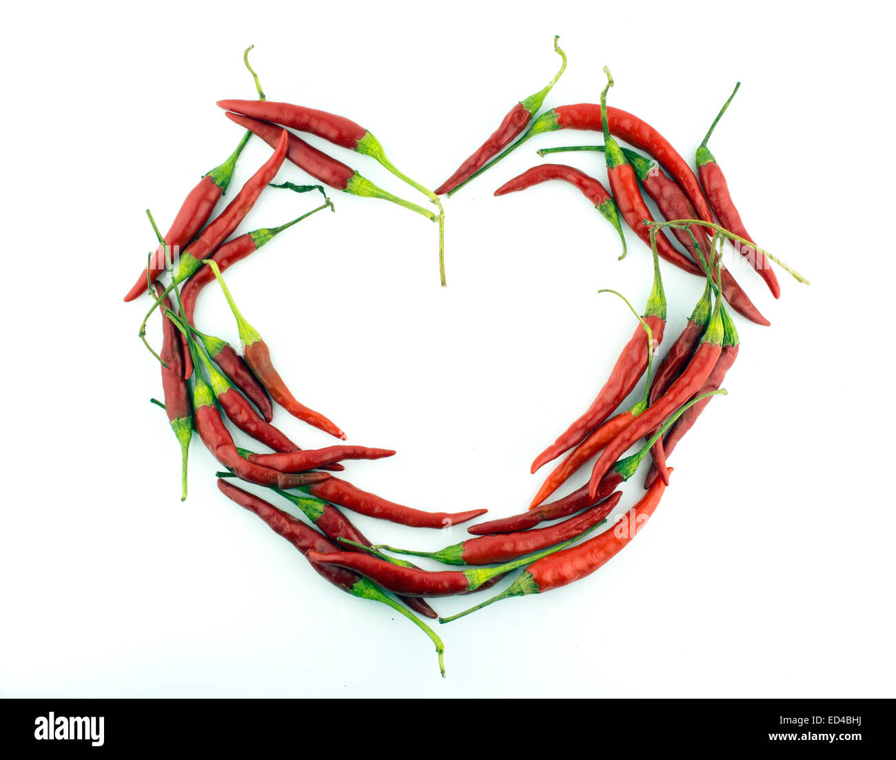 heart of chili pepper isolated on white Stock Photo - Alamy