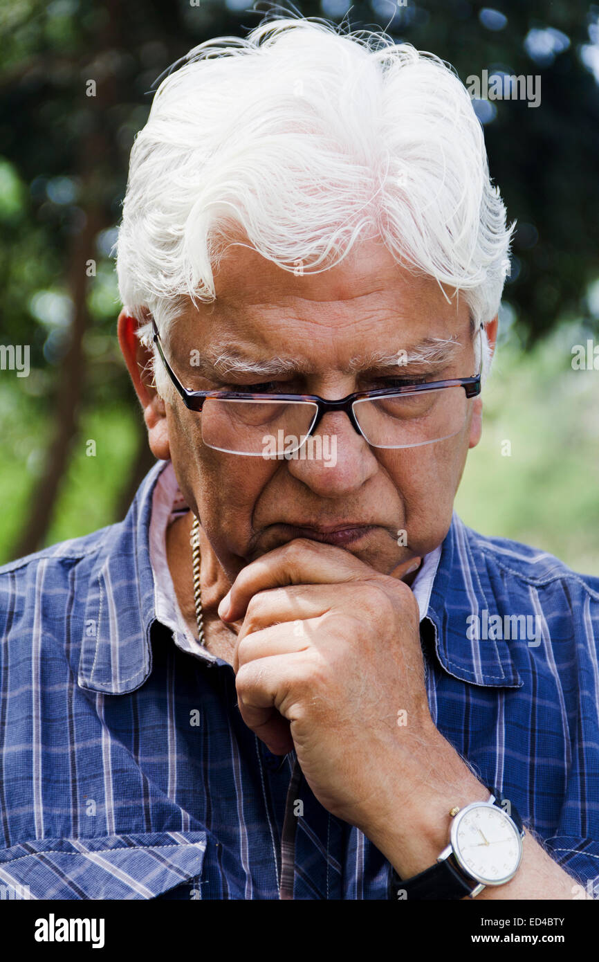 indian Old man park thinking Stock Photo - Alamy