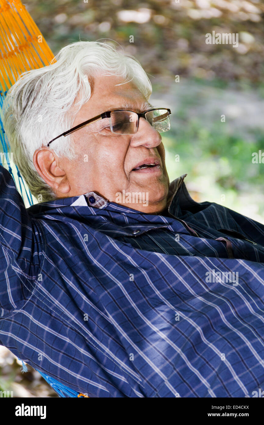 Resting indian man hi-res stock photography and images - Alamy