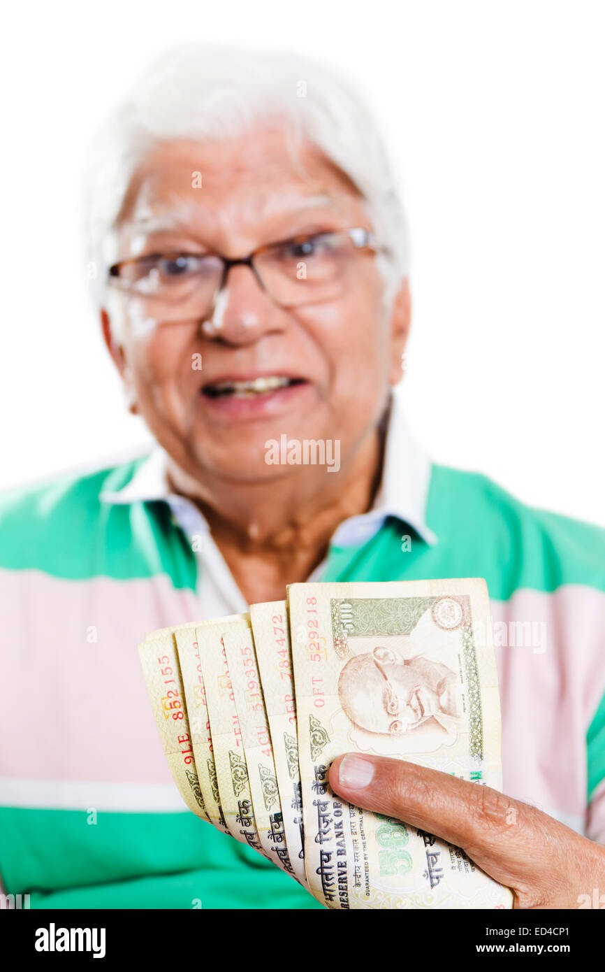 Happy senior man holding money hi-res stock photography and images - Alamy