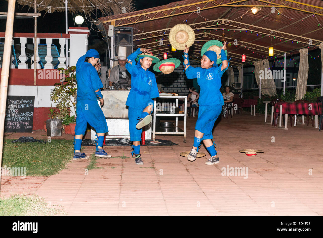 Tibetan fire dancers performing in gardens of a hotel in Goa for ...