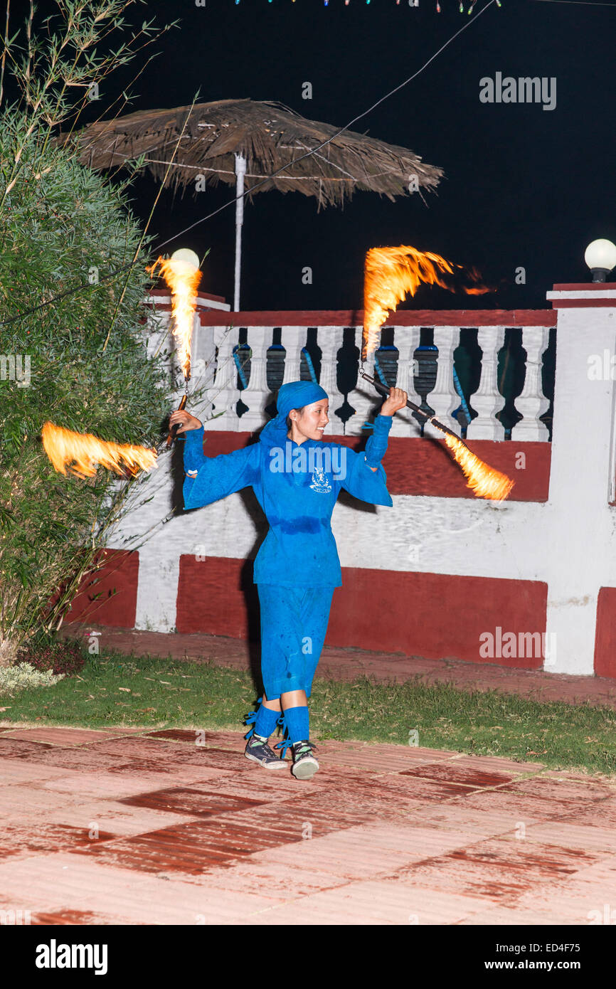 Tibetan fire dancers performing in gardens of a hotel in Goa for ...