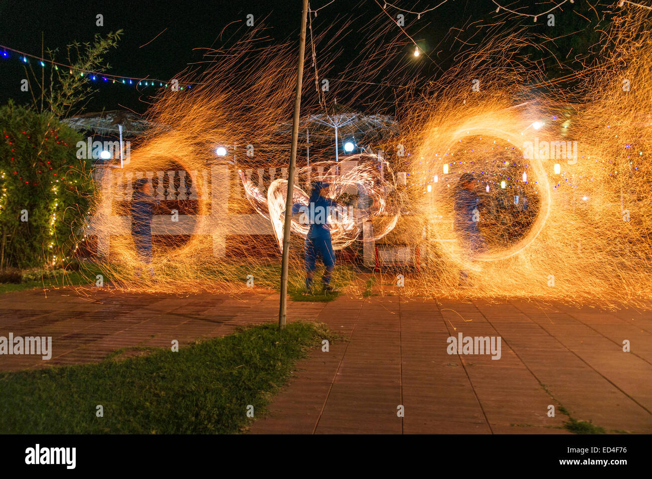 Tibetan fire dancers performing in gardens of a hotel in Goa for ...