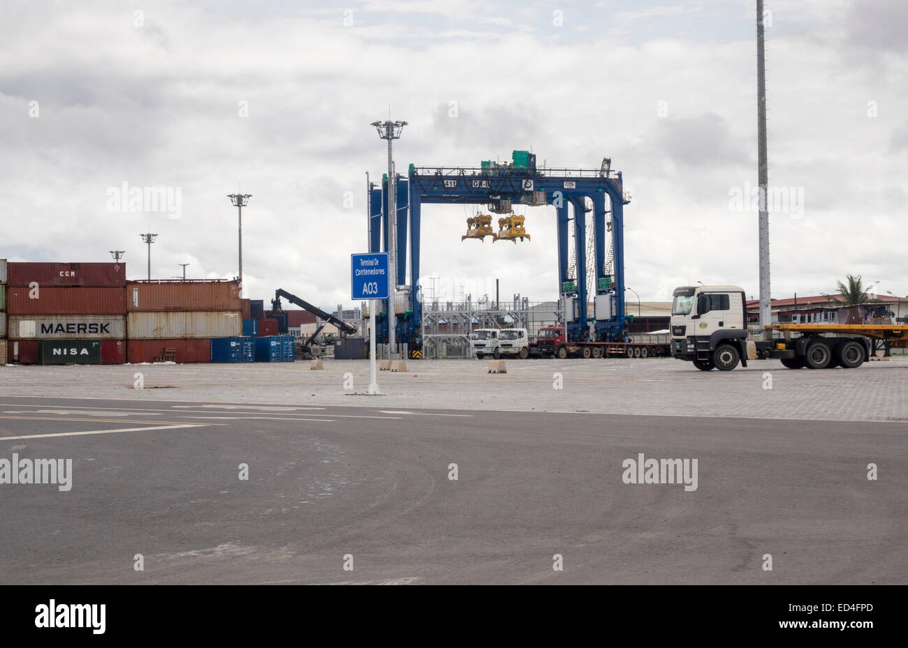 Lifting crane and shipping containers at the new port expansion in Bata ...