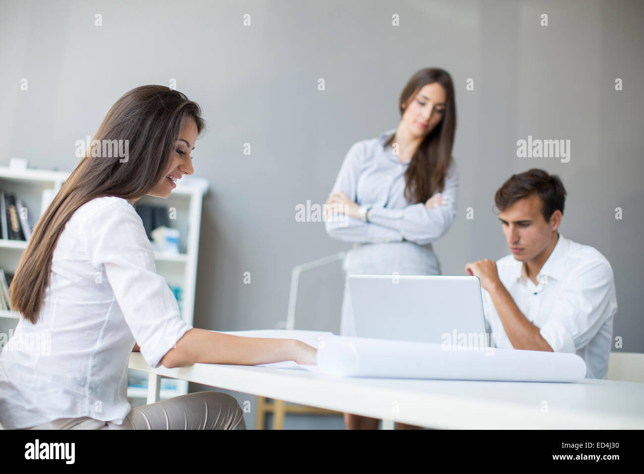 Young people in the office Stock Photo - Alamy