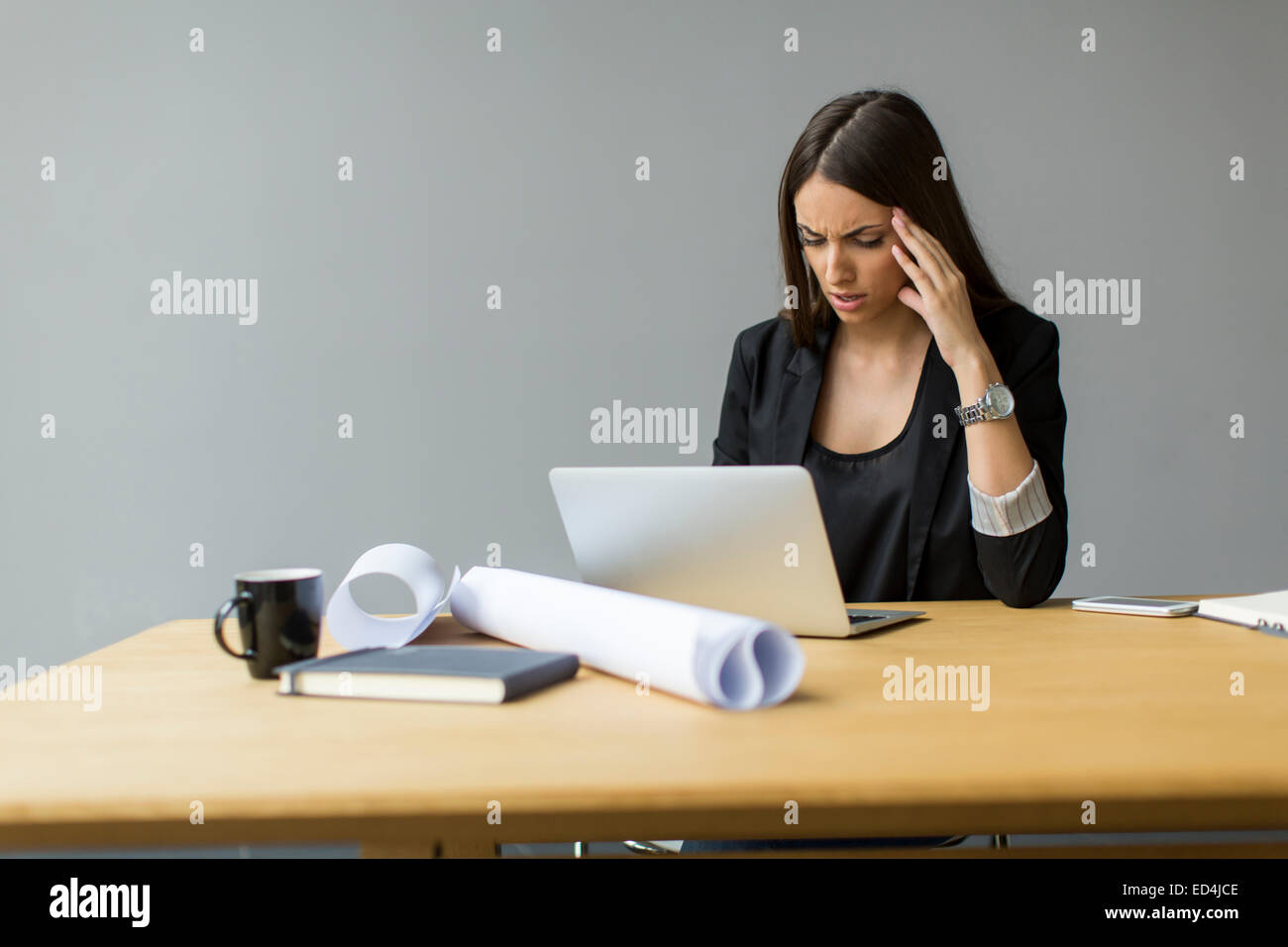 Serious young woman in bright hi-res stock photography and images - Alamy