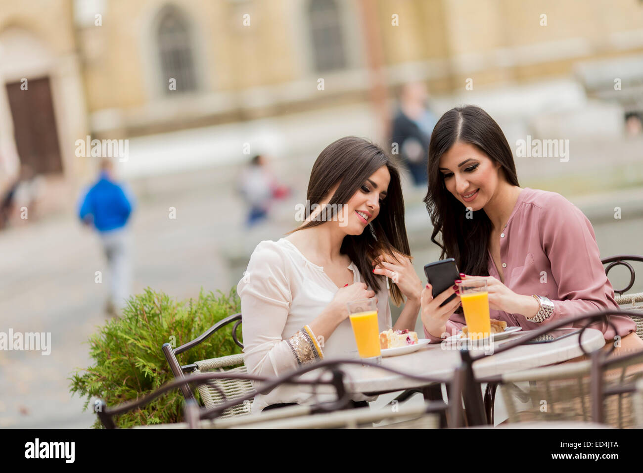 Young women in the cafe Stock Photo - Alamy
