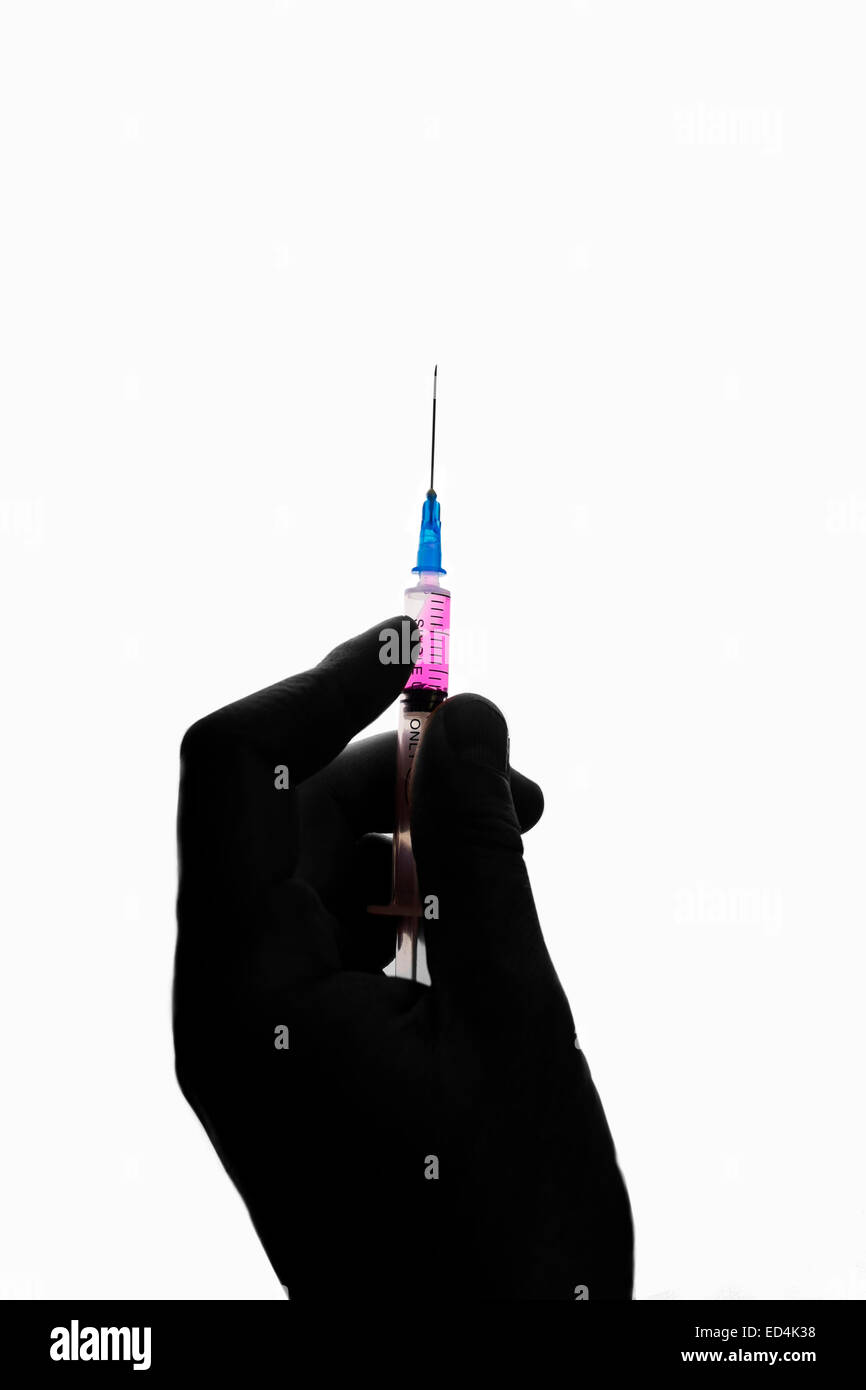 Syringe in Hand Stock Photo - Alamy