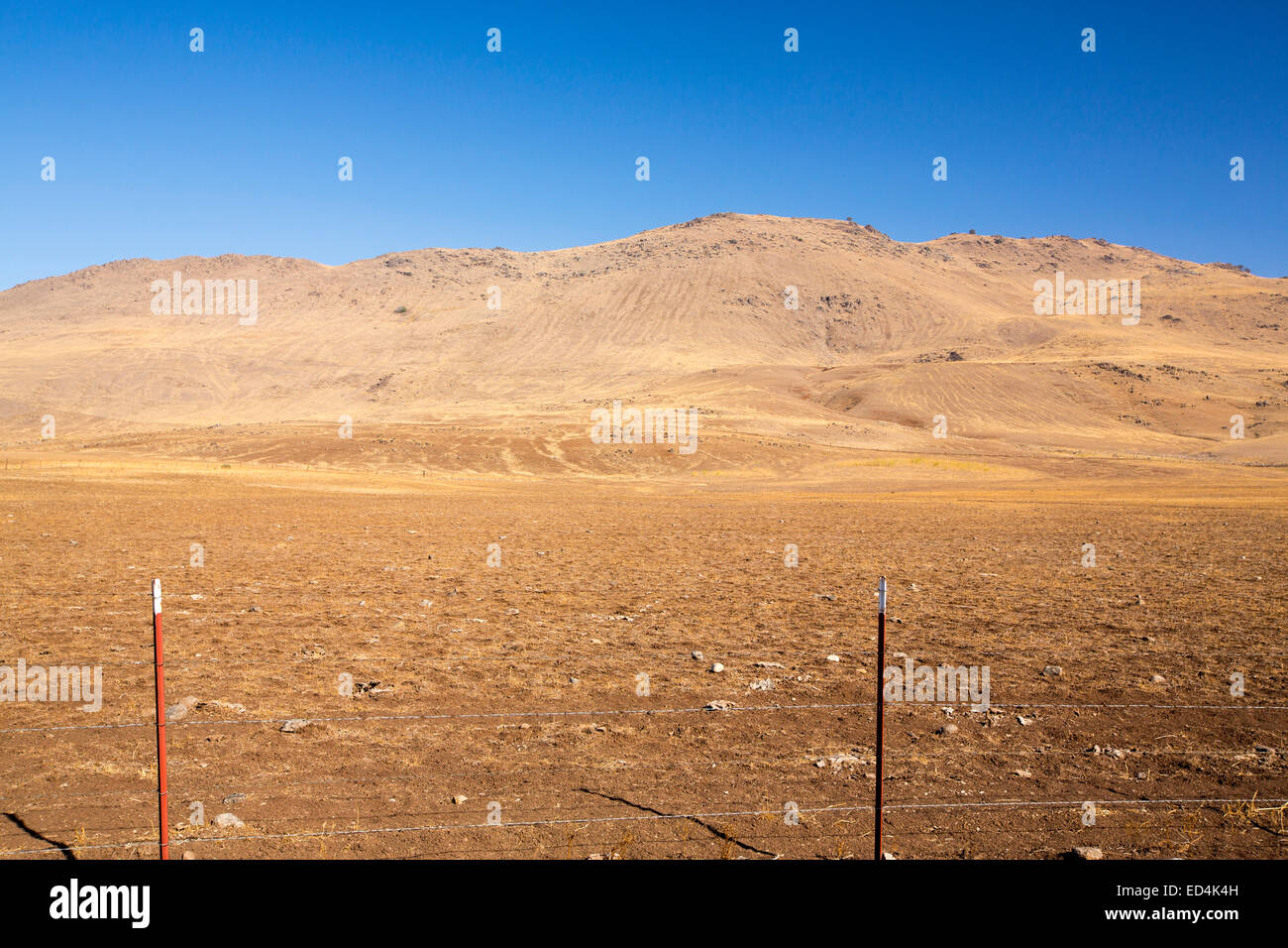 Drought parched farmland near Fresno, California, USA. Following an ...