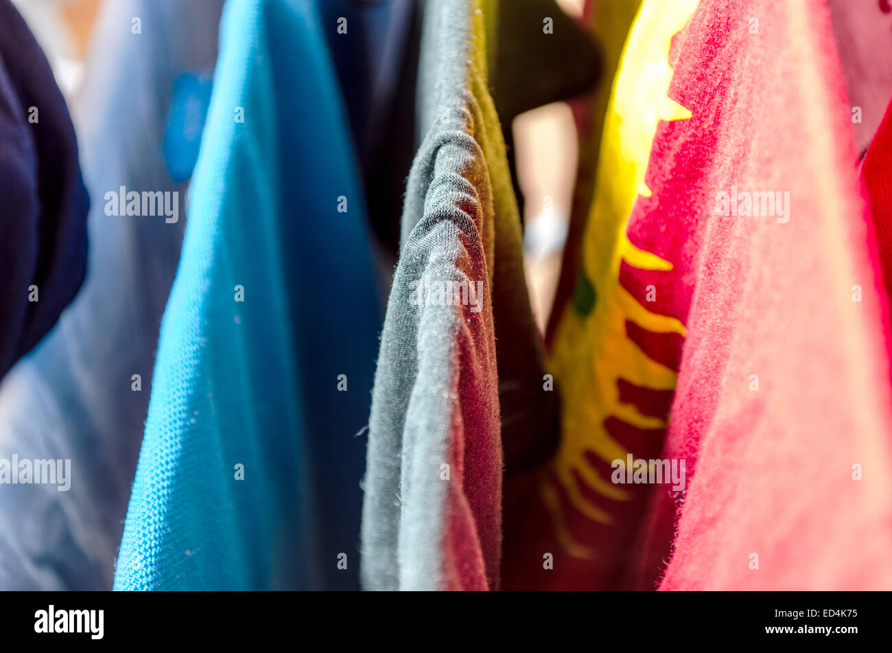 Pile of colorful laundry clothes close up Stock Photo - Alamy