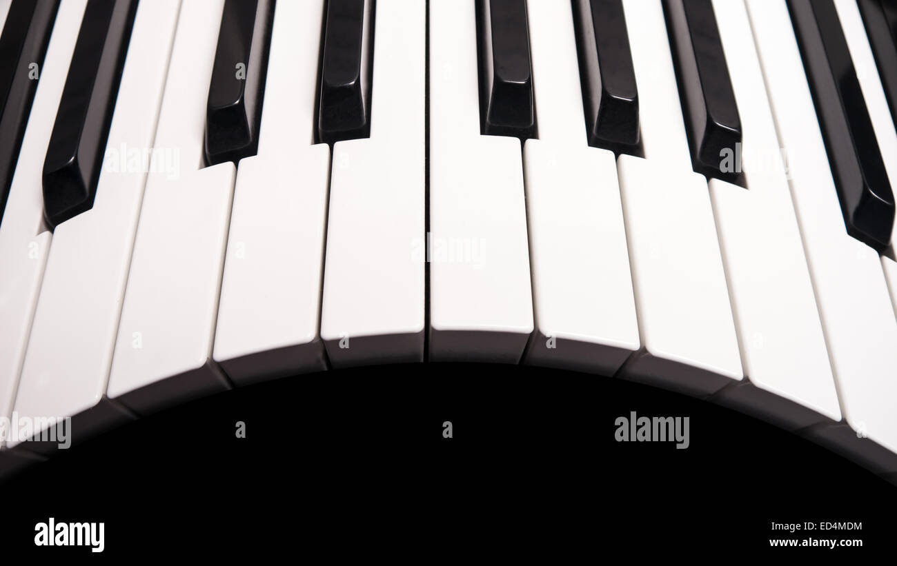 curved piano keys, abstract photo illustration Stock Photo - Alamy