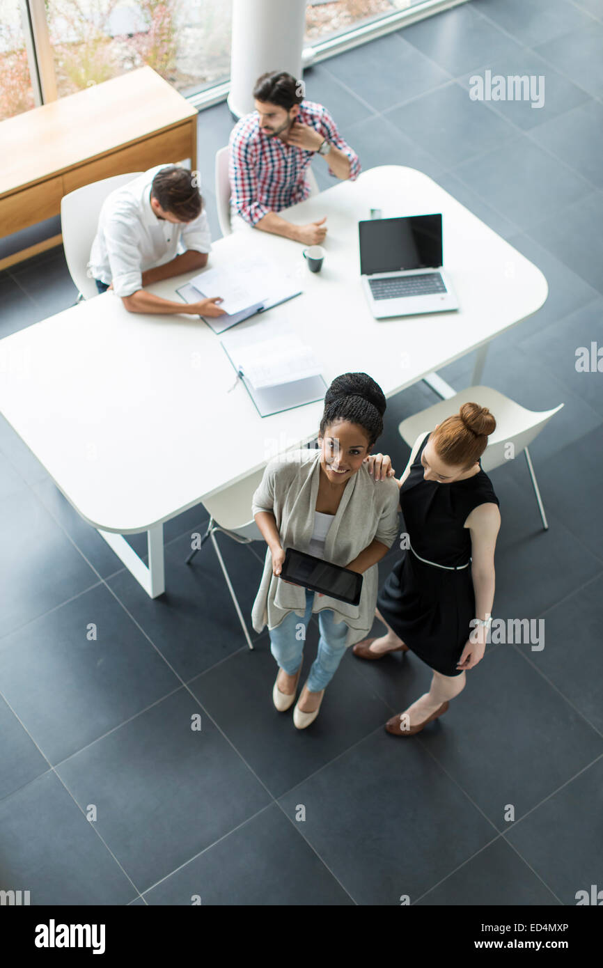 Young people in the office Stock Photo - Alamy