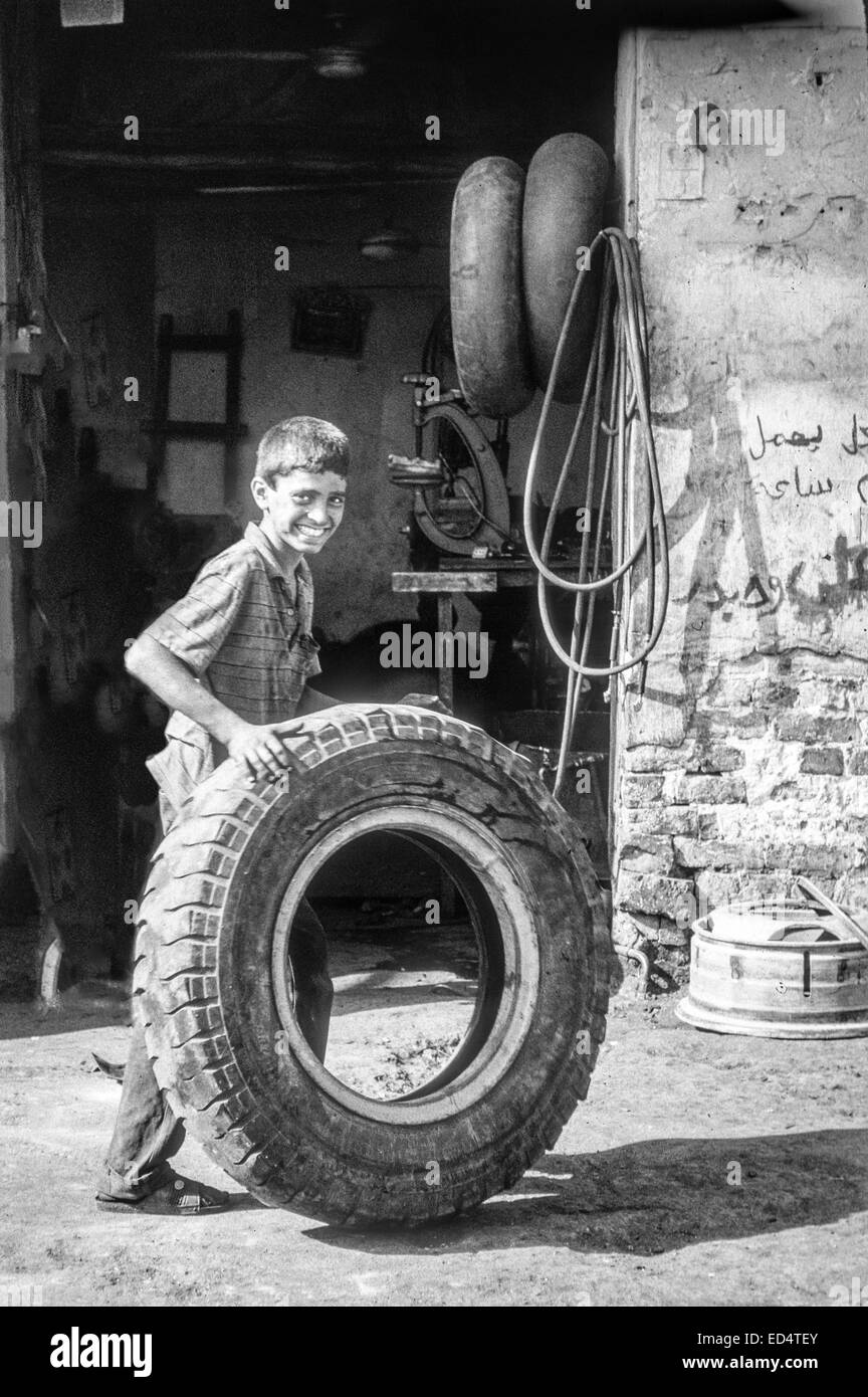 Young Iraqi boy who works in a garage to support his family after his ...