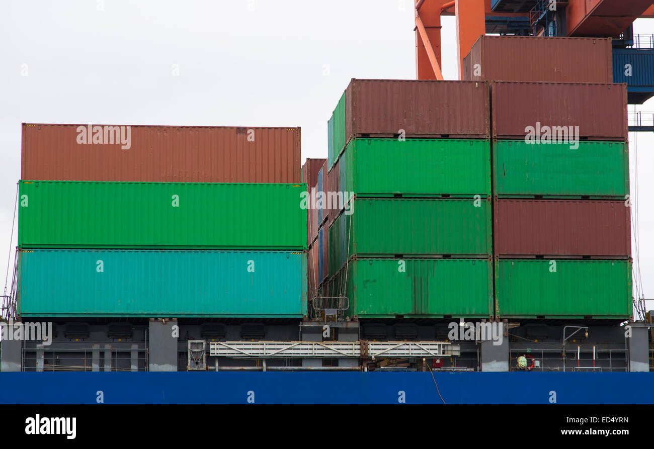 Containers over a Container Ship in Port Stock Photo - Alamy