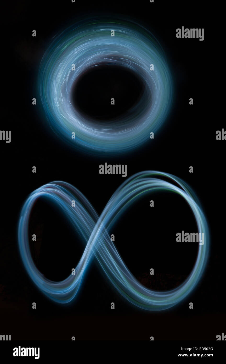 swirling spinning motion and trails traces of moving lights creating ...