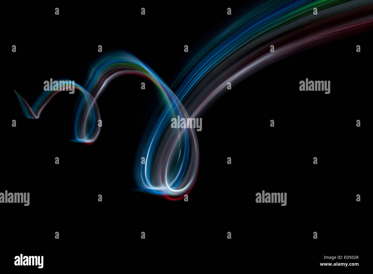 swirling spinning motion and trails traces of moving lights creating ...