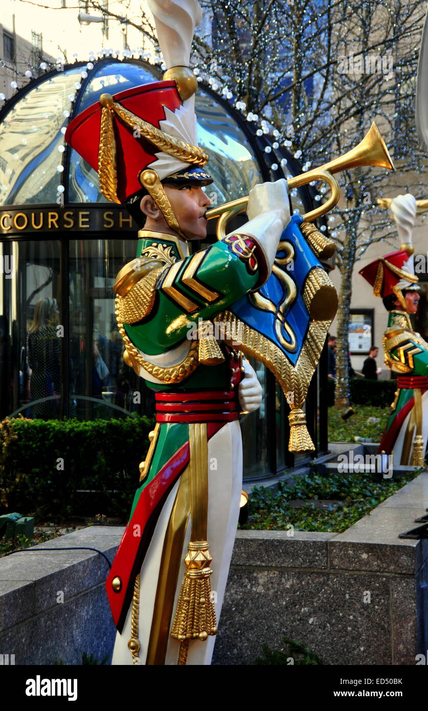 New York City: Christmas musicians playing trumpets line the terrace ...