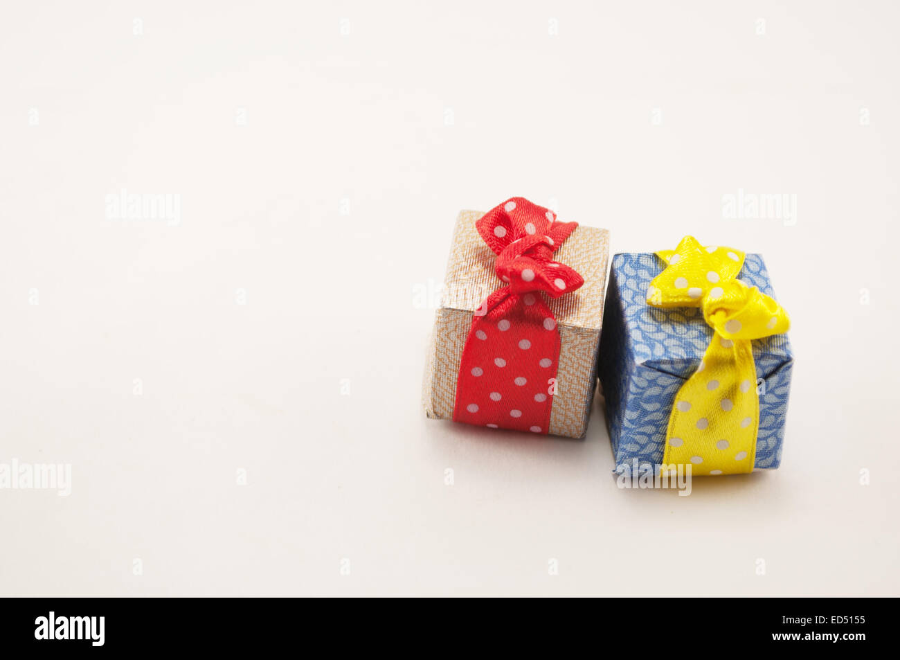 gifts in colorful package isolated on holiday Stock Photo - Alamy