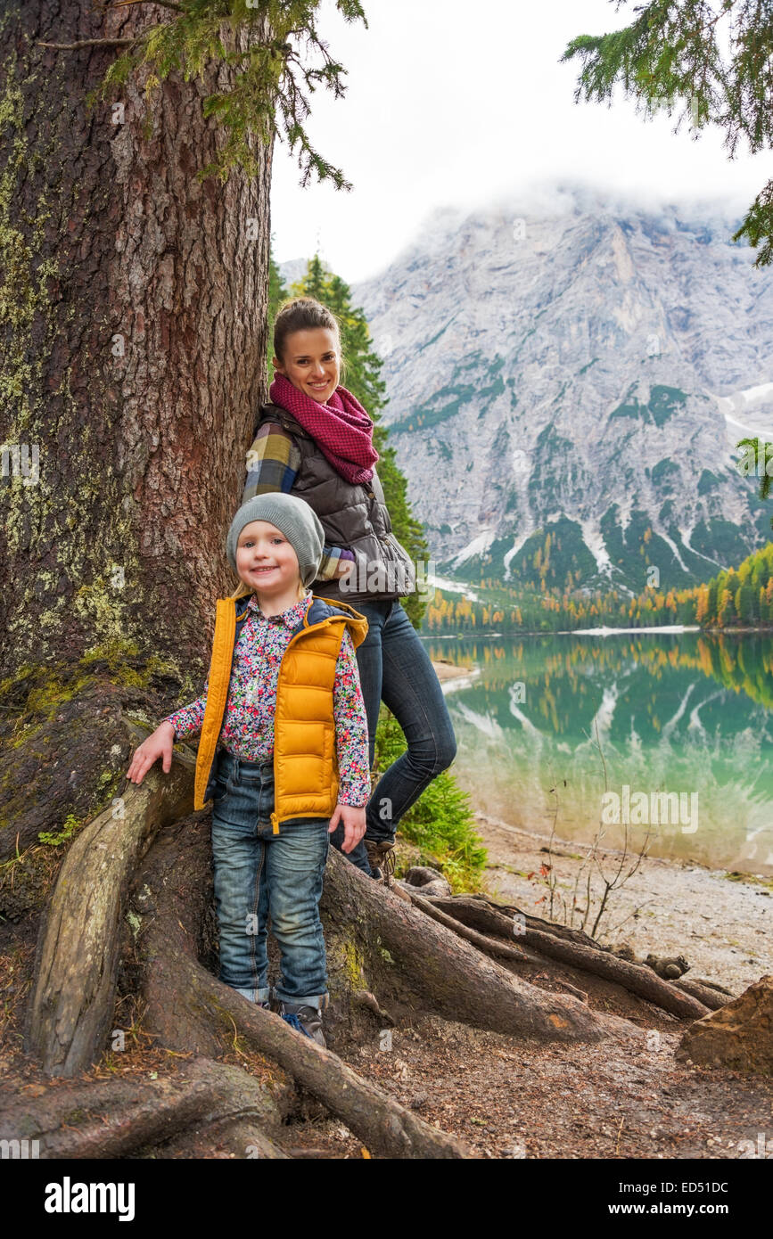 Girl stand near tree hi-res stock photography and images - Alamy