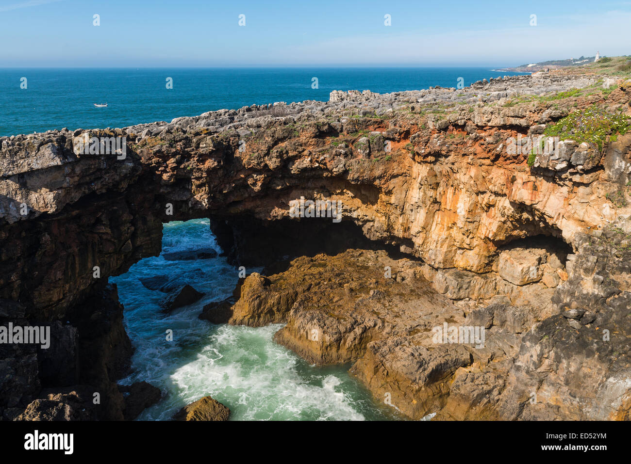 The rocky coastline of Cascais is famous for the cave named, The jaws ...