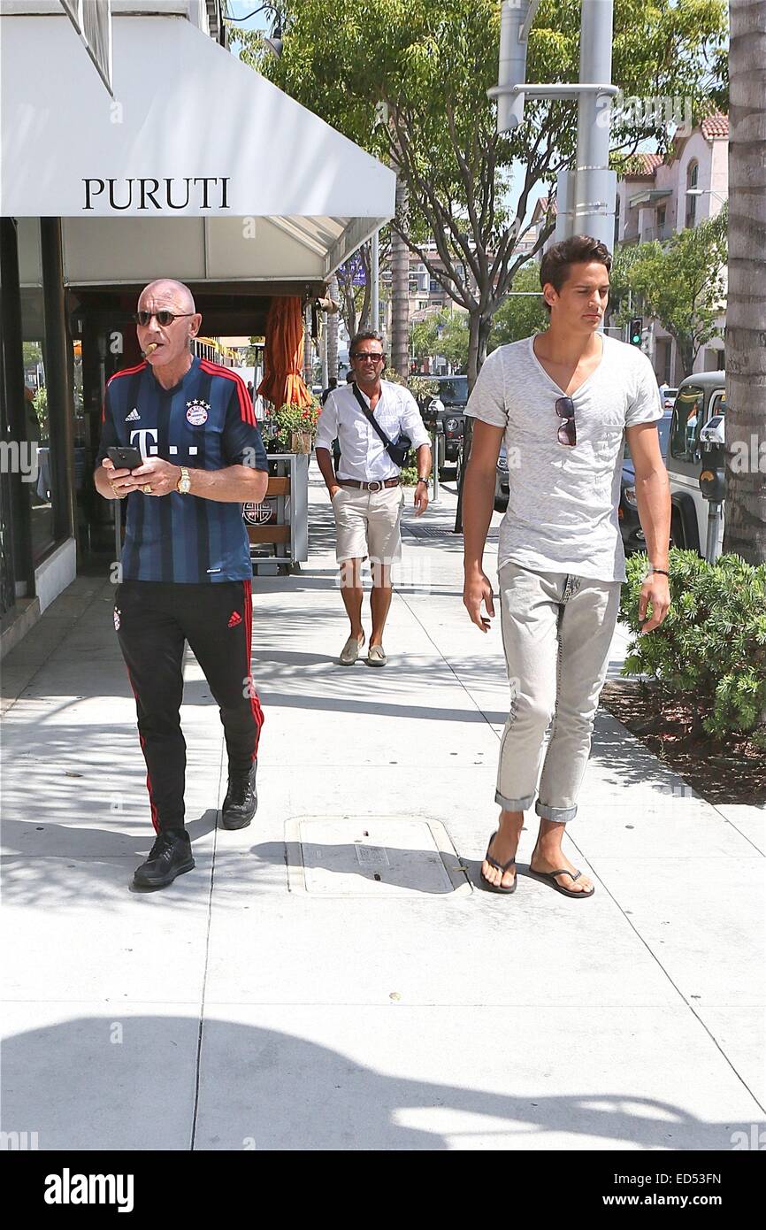 Frédéric Prinz von Anhalt smoking a cigar as he wears his FC Bayern ...