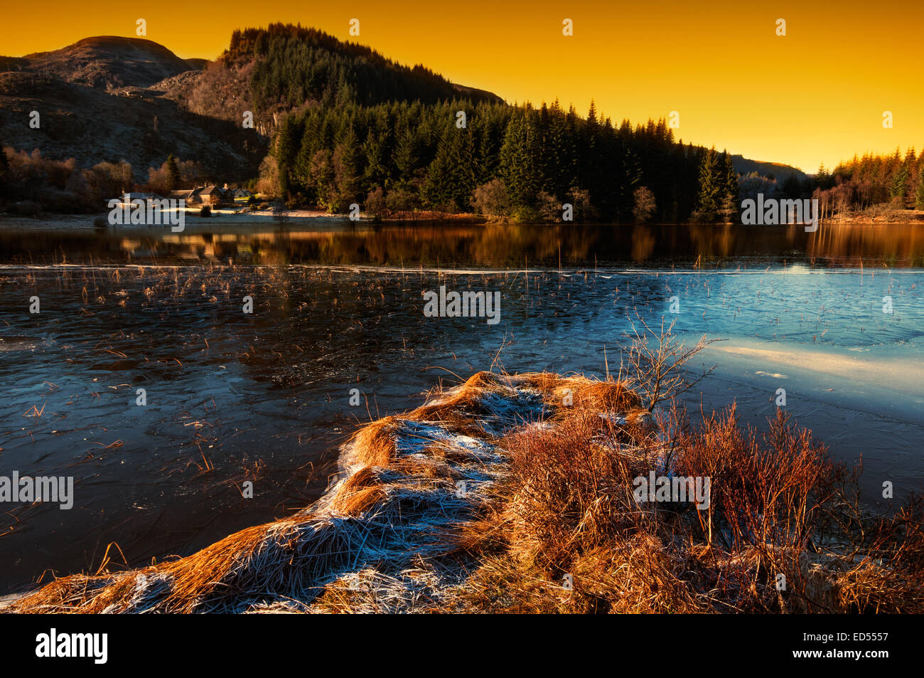 Sun down over Loch Chon in the Loch Lomond and Trossachs National Park ...