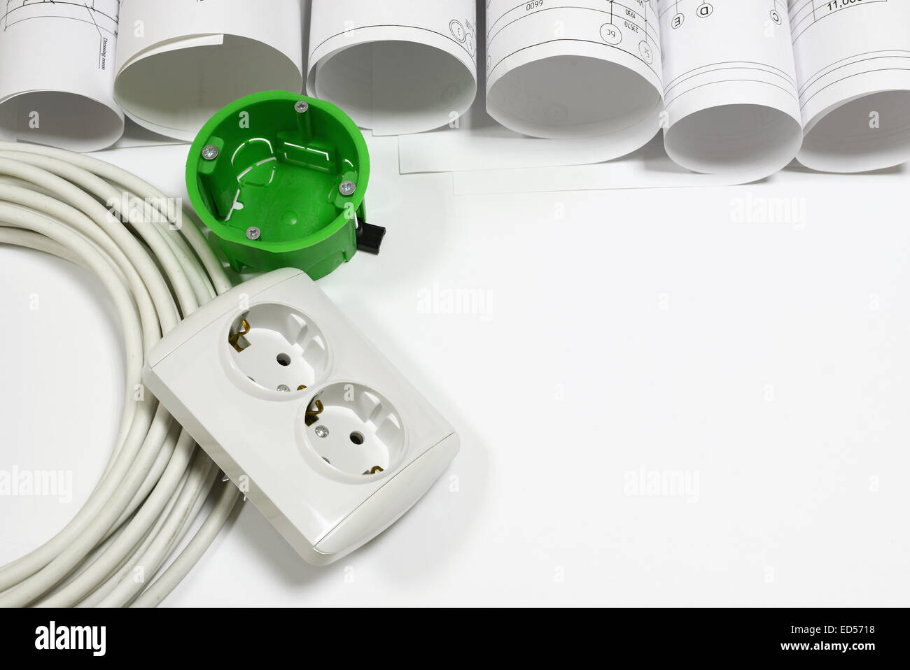 Drawing rolls and electrical hardware items composition Stock Photo - Alamy