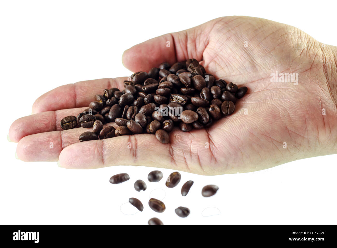 Fresh roasted coffee beans pouring, isolated on white Stock Photo - Alamy